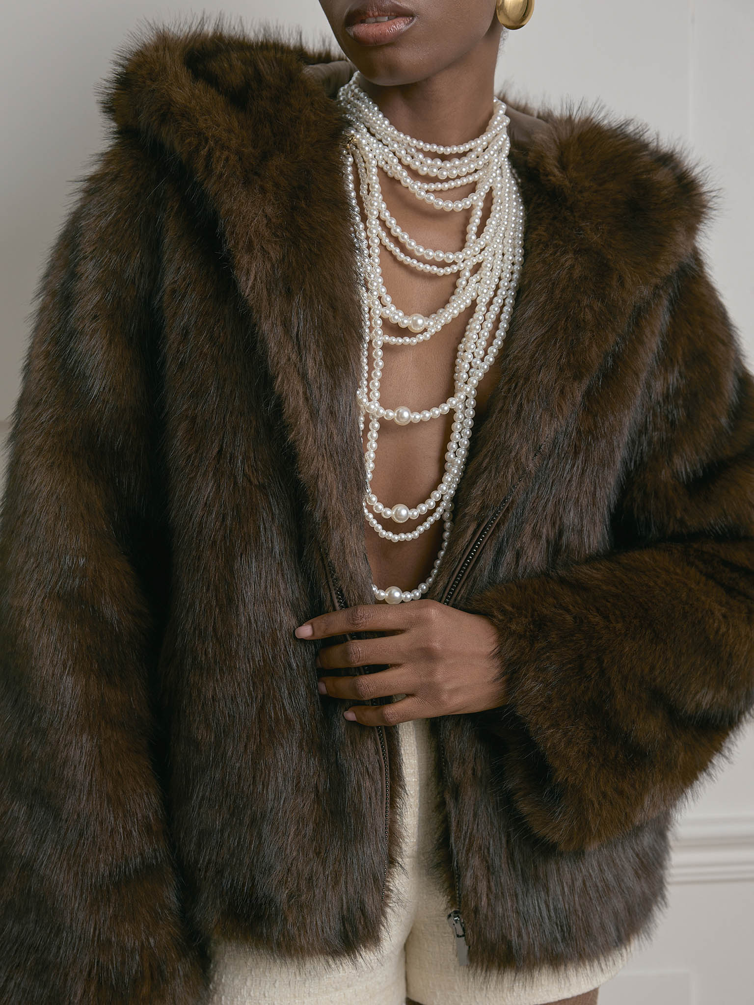 Short eco-fur coat with a zip and a hood :: LICHI - Online fashion store